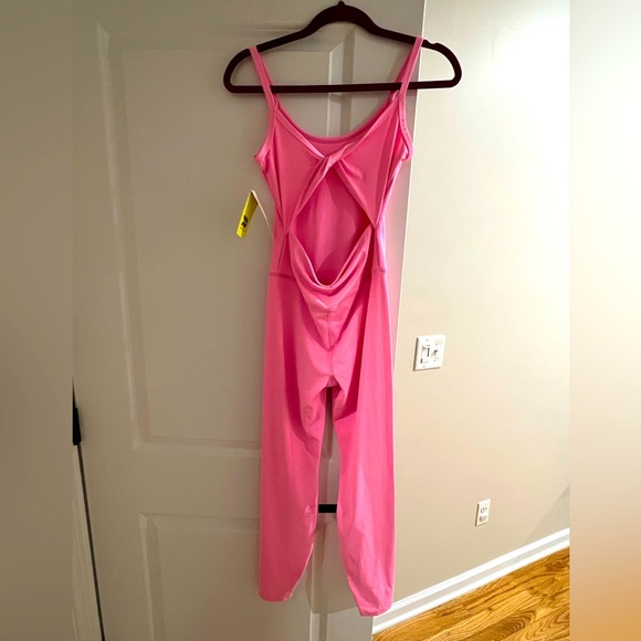 Pants & Jumpsuits | Nwt Pink Onesie Workout With Twist Open Back | Poshmark